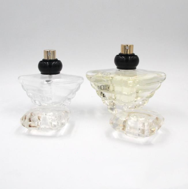 Triangular perfume glass bottle